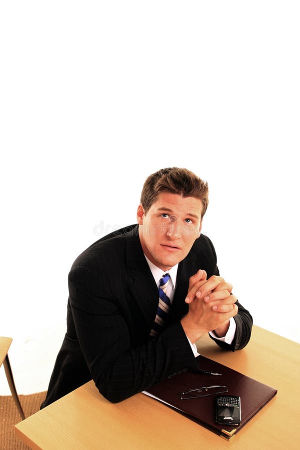 Man Praying at Desk stock image. Image of troubled, kneel - 6374813