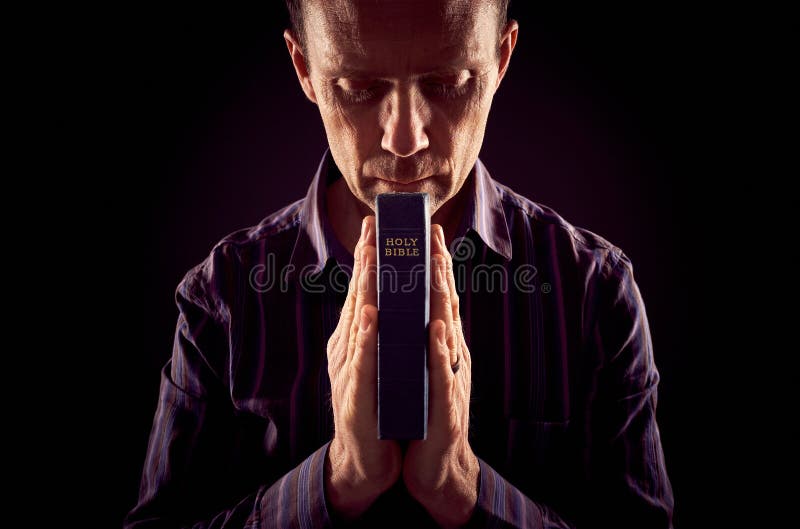 A man praying. stock image. Image of calm, faithful, devout - 53820277