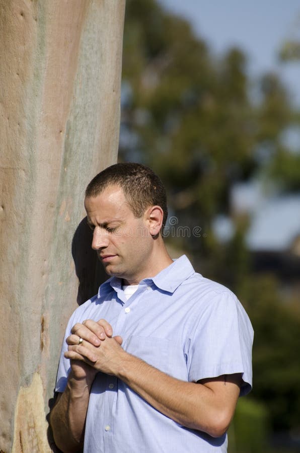 Man praying outside. stock image. Image of focus, bible - 74749517