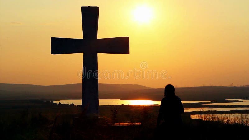 Man Praying Under the Cross Stock Footage - Video of catholic, dawn ...