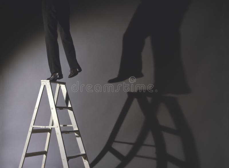 Man precariously on ladder stock image. Image of concept - 5919883