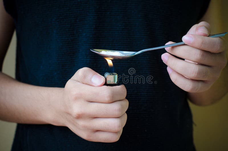 Man prepares drug in spoon stock image. Image of hand - 52730363