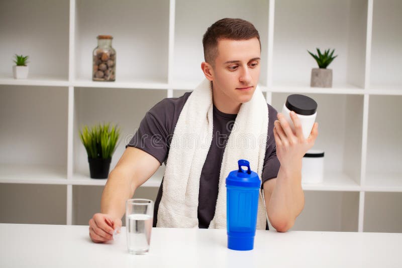 Man Prepares a Protein Shake in the Shaker after Training Stock Photo ...