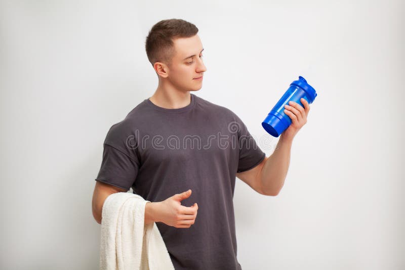 Man Prepares a Protein Shake in the Shaker after Training Stock Image ...