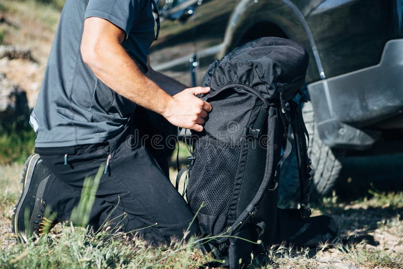 Man Preparing Backpack for Climbing Stock Image - Image of summer ...