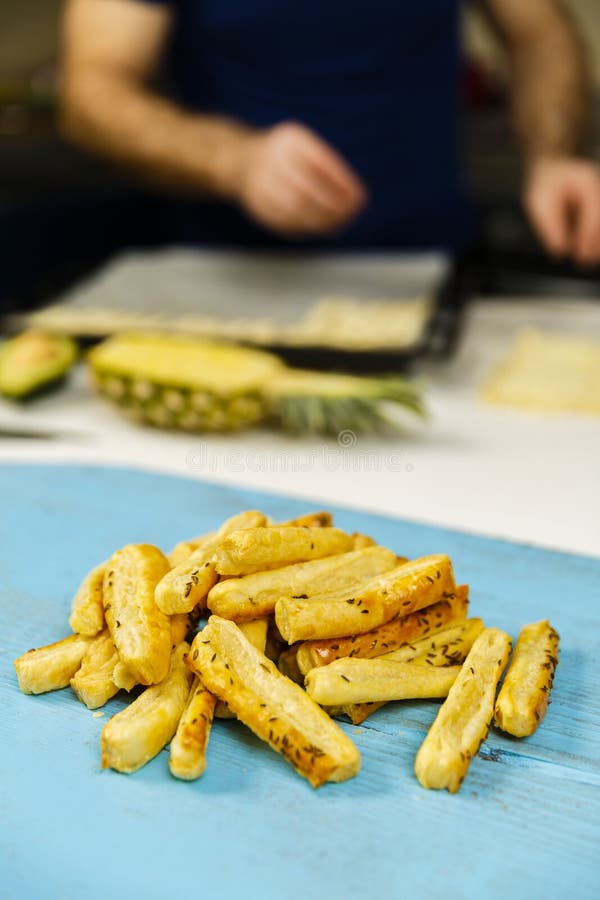 Man Preparing Cheese Crackers at Home Stock Photo - Image of apartment ...