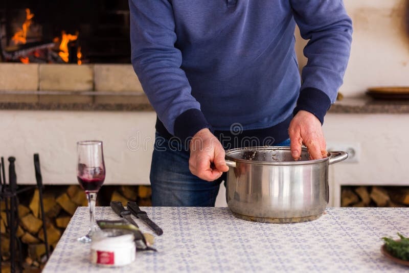 The Man is Preparing Dinner on the Background of the Burning Flame of ...