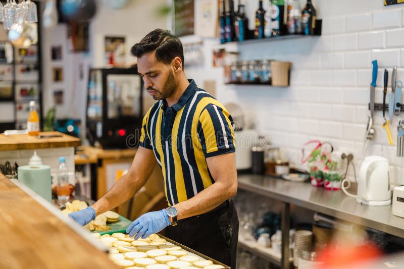 Man Preparing Fresh Food in Commercial Kitchen Stock Image - Image of ...