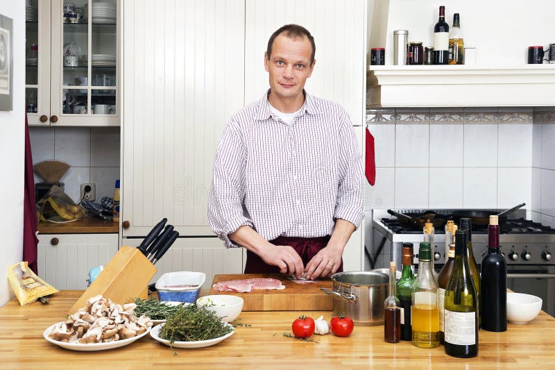 Man Preparing Meat at Kitchen Counter Stock Image - Image of meat ...