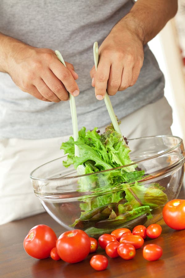 Man preparing salad stock photo. Image of healthy, comfort - 23243818