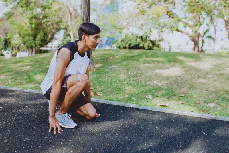 Man Preparing To Run in Park Stock Photo - Image of fitness, sprint ...