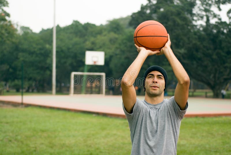 Man Preparing To Shoot Basketball - Horizontal Stock Image - Image of ...