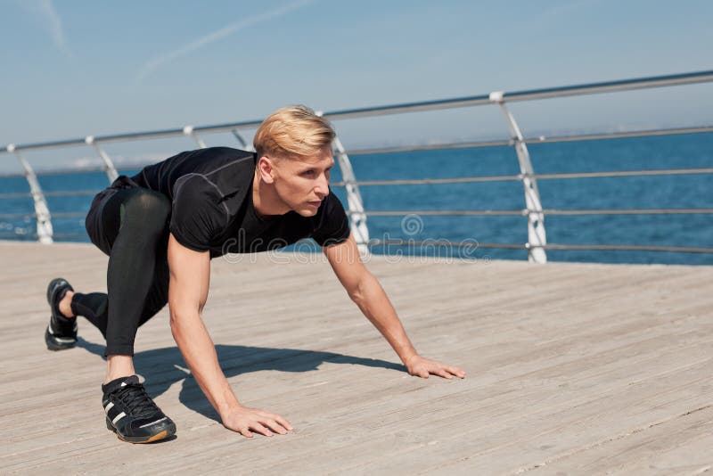 Man Preparing To Sprint on Pier Stock Image - Image of athletics, speed ...