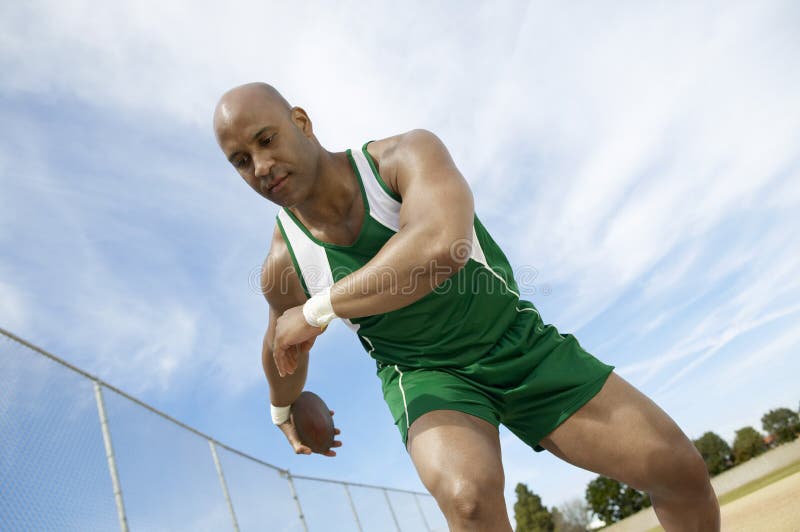 Man Preparing To Throw Discus Stock Photo - Image of fitness, field ...