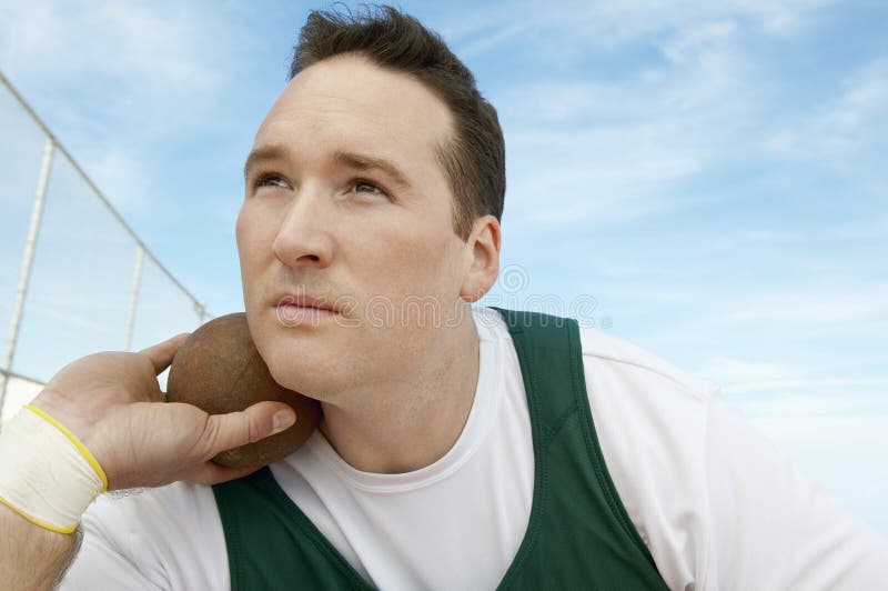 Man Preparing To Toss Shot Put Stock Photo - Image of caucasian ...