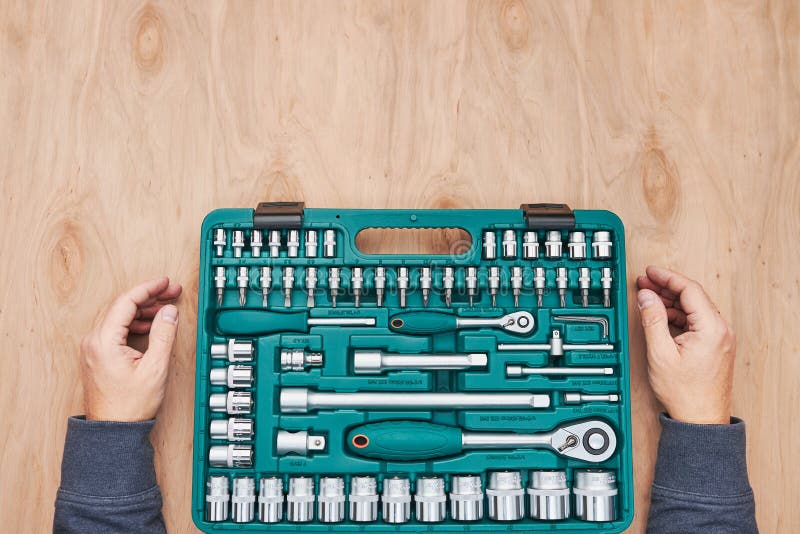 Man Preparing Tools in Workshop. Wrench, Spanner and Ratchet with Many ...