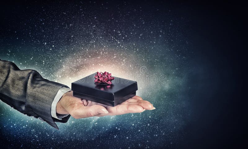 Man presenting his gift stock photo. Image of male, happy - 66440420