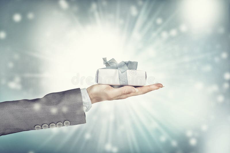 Man presenting his gift stock photo. Image of adult, giving - 66440632