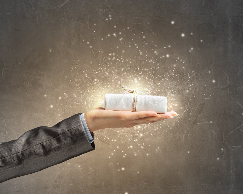 Man presenting his gift stock image. Image of event, hand - 67589541