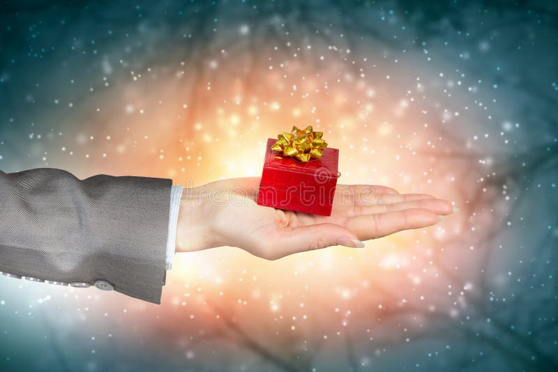 Man presenting his gift stock photo. Image of celebration - 68409776