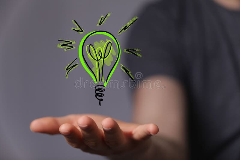 Man Presenting Illustrated Light Bulb Over His Hand Stock Image - Image ...