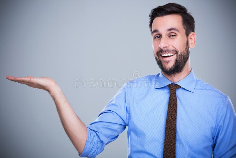 Man presenting something stock image. Image of adults - 64875155