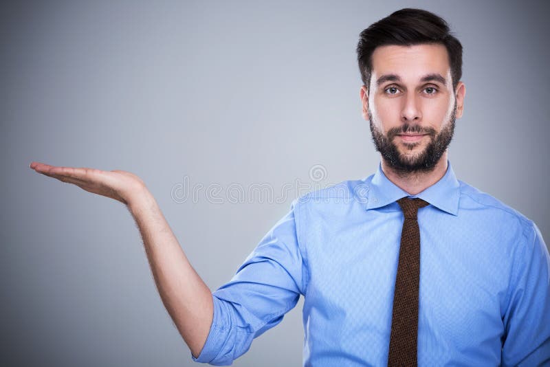 Man presenting something stock image. Image of caucasian - 64875419