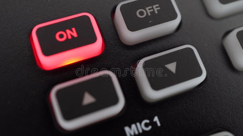 The Man Presses the Button To Turn on the Microphone. the Button Lights ...