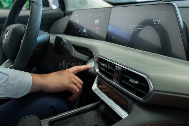 A Man Presses the Car Engine Start Button. Stock Image - Image of black ...