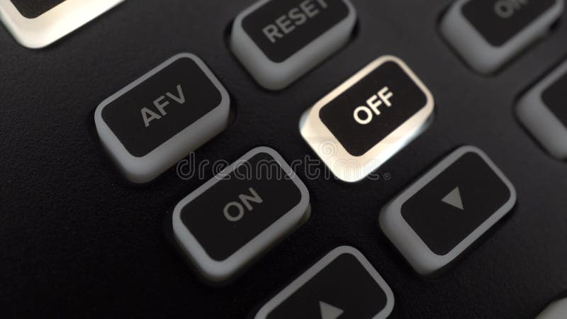 A Man Presses the Off Button on the Video Remote Control. Video Mixer ...