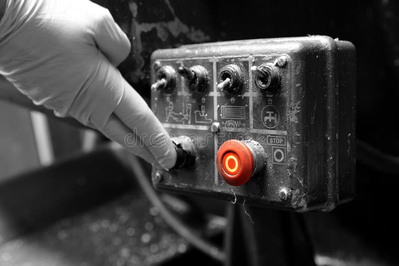 Man Pressing Button on an Industrial Machine Stock Photo - Image of ...