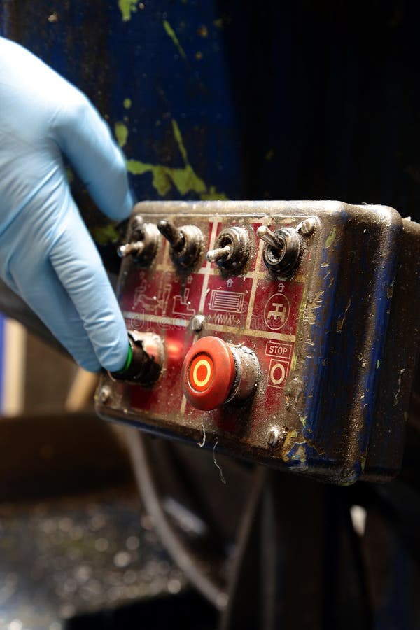 Man Pressing Button on an Industrial Machine Control Panel. with ...