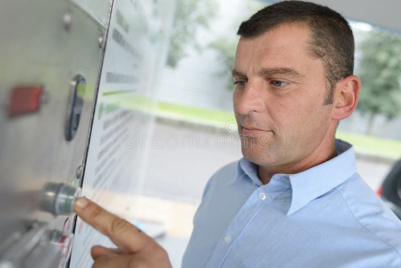 Man Pressing Button on Parking Machine Stock Image - Image of payment ...