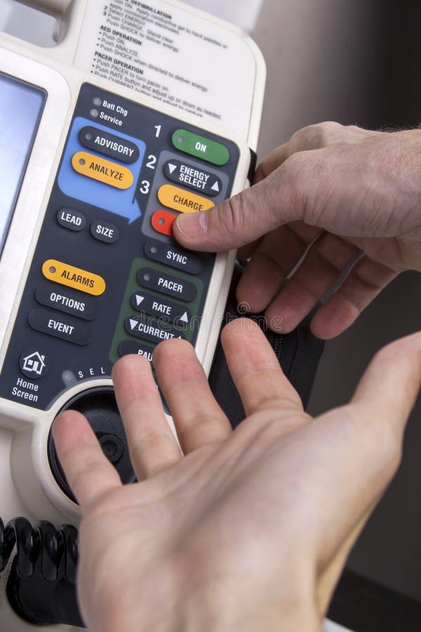 Man Using Aed Defibrillator Stock Photos - Free & Royalty-Free Stock ...