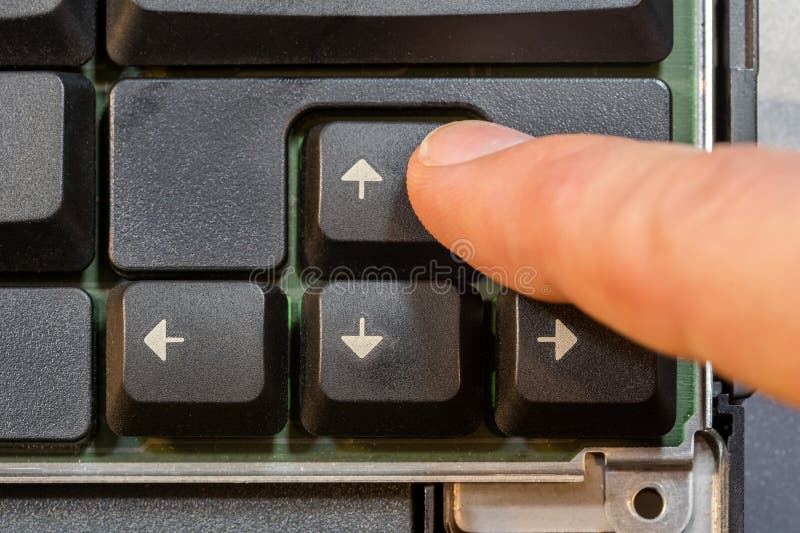 Man Pressing the Up Arrow Key on a Simple Laptop Computer Keyboard, Top ...