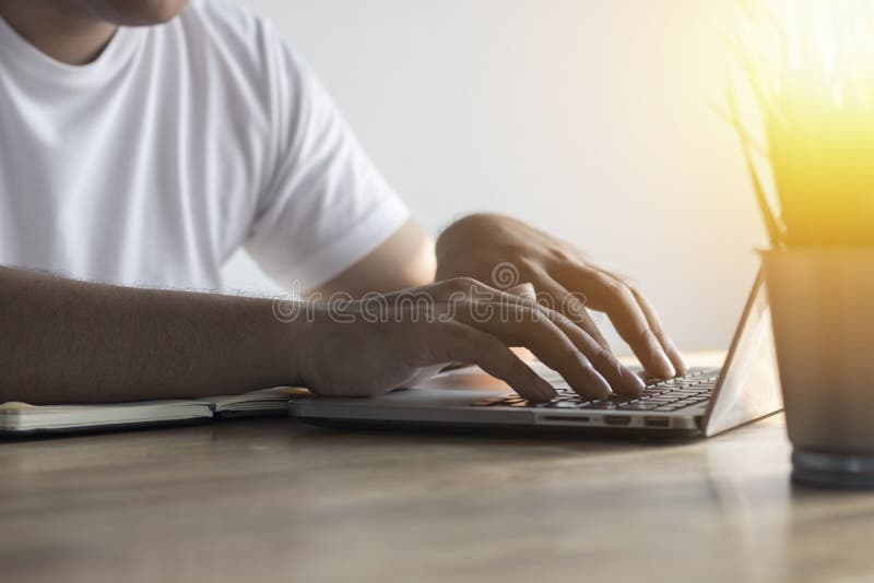 Man Pressing and Using Computer in Library for Searching and Fin Stock ...