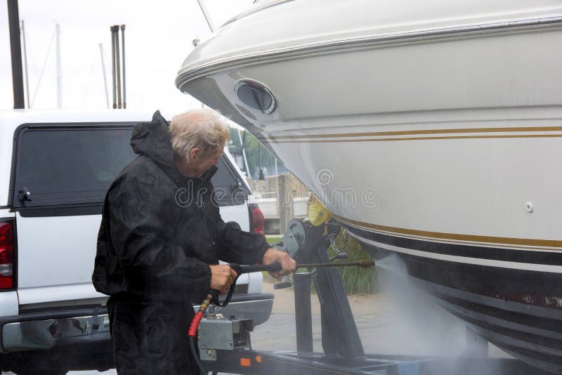 Man Washing Boat stock image. Image of canal, mopping, ontario - 358541