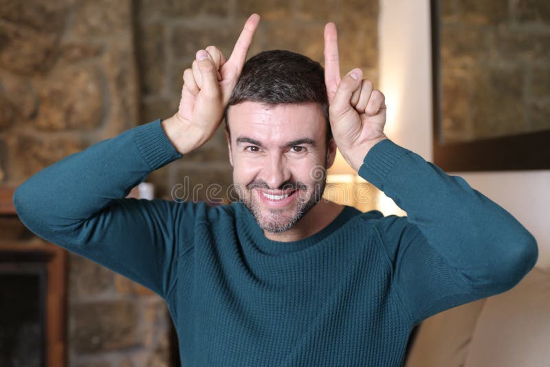 Man Pretending To Have Horns Stock Image - Image of adult, cutie: 247656055