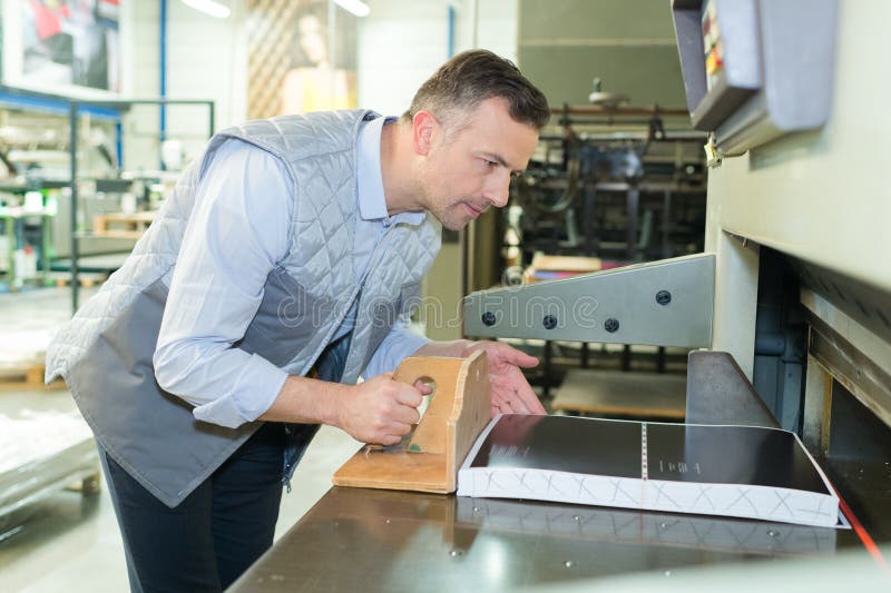 Man Printing Press Cutting Machine Stock Photo - Image of trimming ...