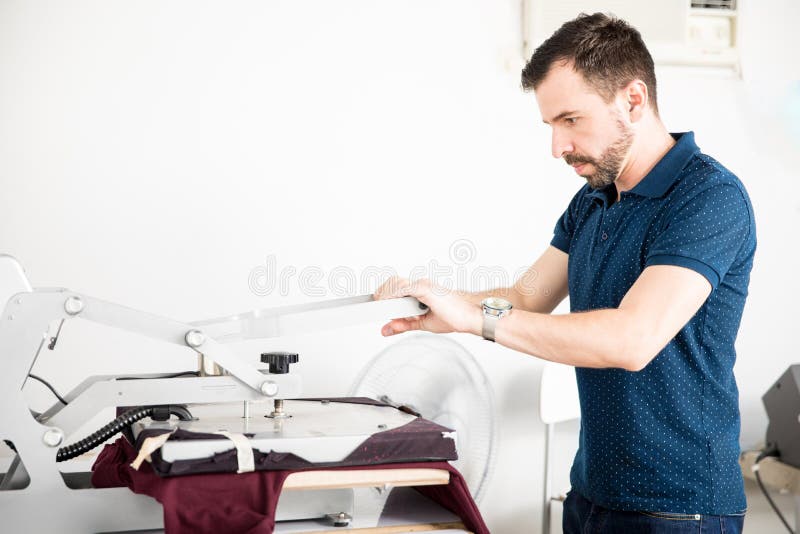Man Printing Shirt in a Workshop Stock Photo - Image of handsome ...