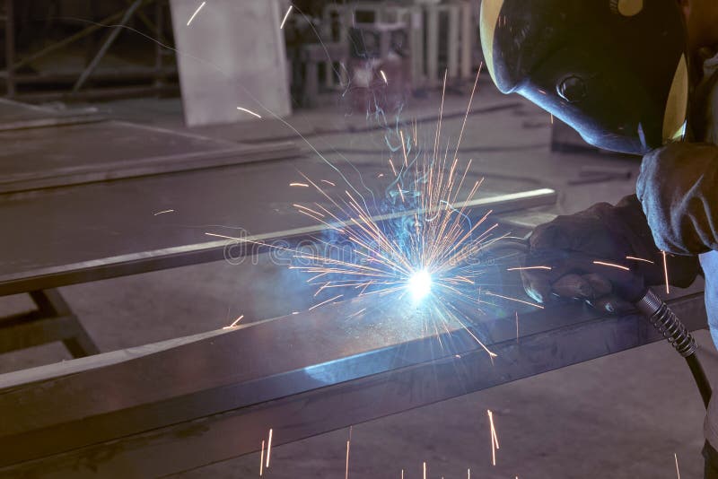 Man Processes Metal with Gas Electric Welding Stock Image - Image of ...