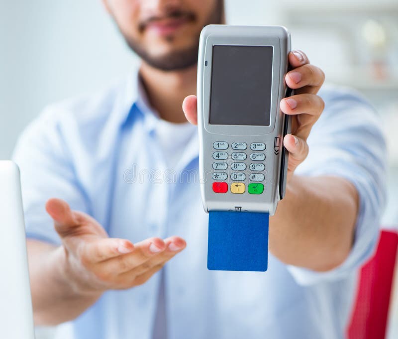 Man Processing Credit Card Transaction with POS Terminal Stock Photo ...