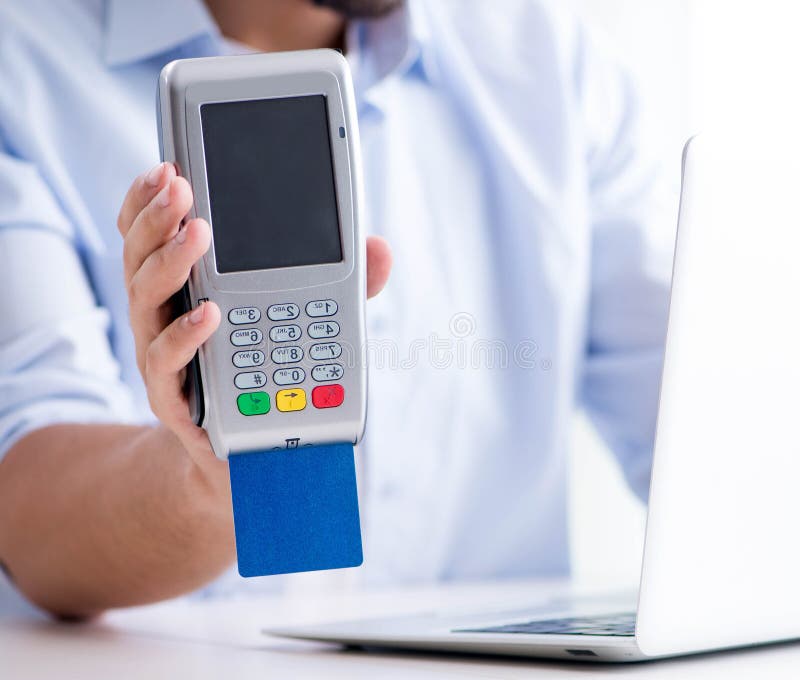 Man Processing Credit Card Transaction with POS Terminal Stock Photo ...