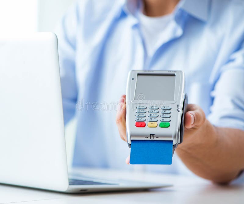 Man Processing Credit Card Transaction with POS Terminal Stock Image ...
