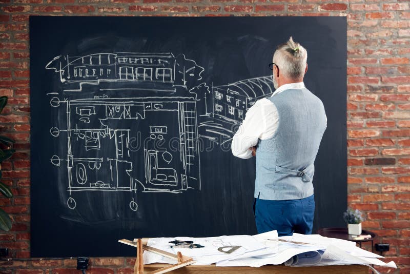 Senior Stylish Man, Professional Architect Looking on Sketches ...