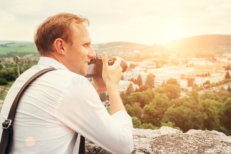 Man with Professional Photo Camera Take Landscape Picture Stock Image ...