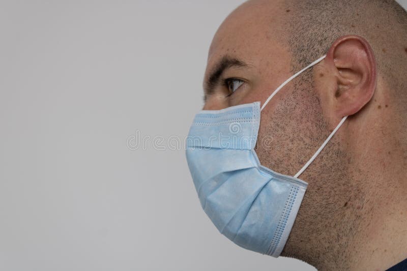Man in profile with mask stock photo. Image of background - 181885804