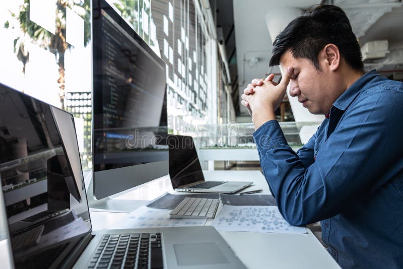Man Programmer Stressed And Headache Project In Software Development Computer In It Company