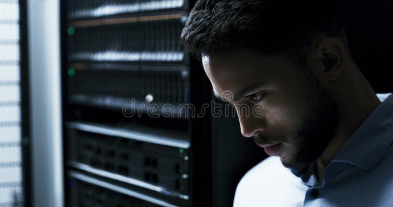 Man, Programmer and Thinking in Server Room for Maintenance, Inspection or Upgrade at Company ...