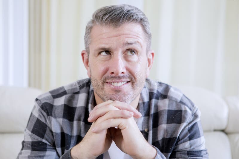 Man Propping His Chin with Both Hands while Smiling Stock Image - Image ...